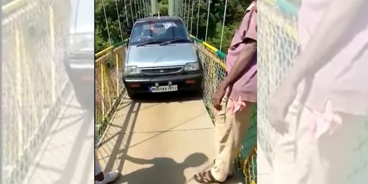 Shocking visuals of a car on pedestrian suspension bridge - The South First